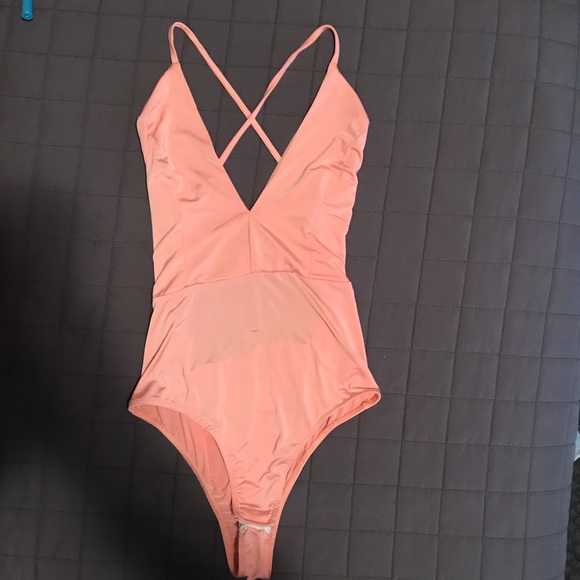 Fashion Nova | Tops | Cross Cross Tie Back Bodysuit | Poshmark